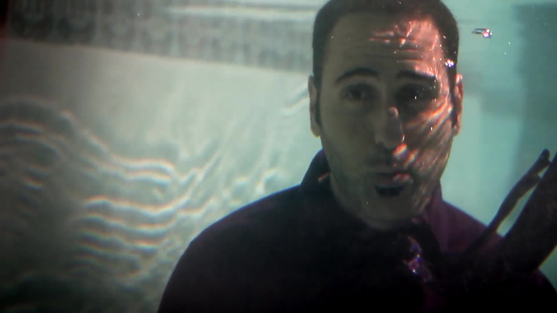 Clothed Men Barefaced Underwater