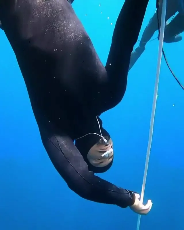 Freediving Barefaced Underwater In Tight Black Wetsuit