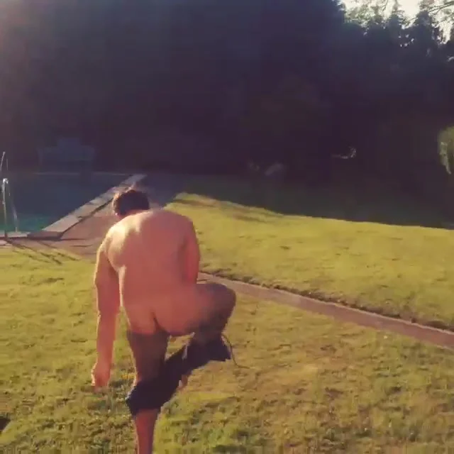 Guy Strips Naked In Pool