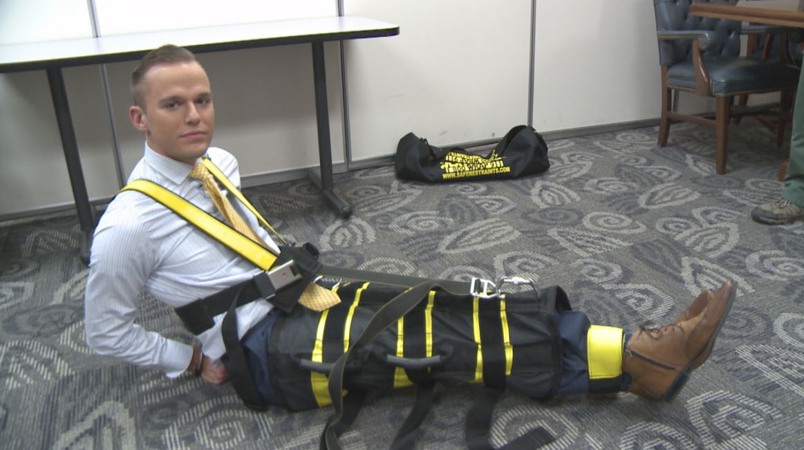 Young Man And Restraint System