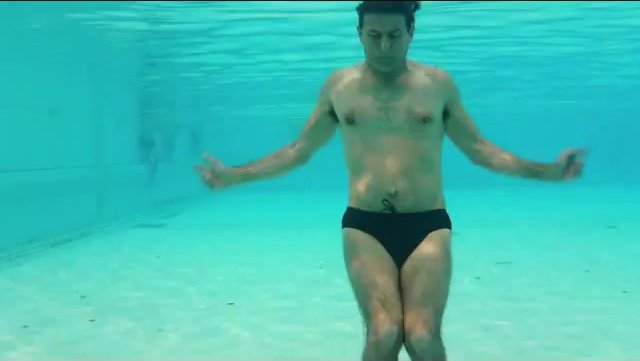 Breatholding Underwater In Black Speedo