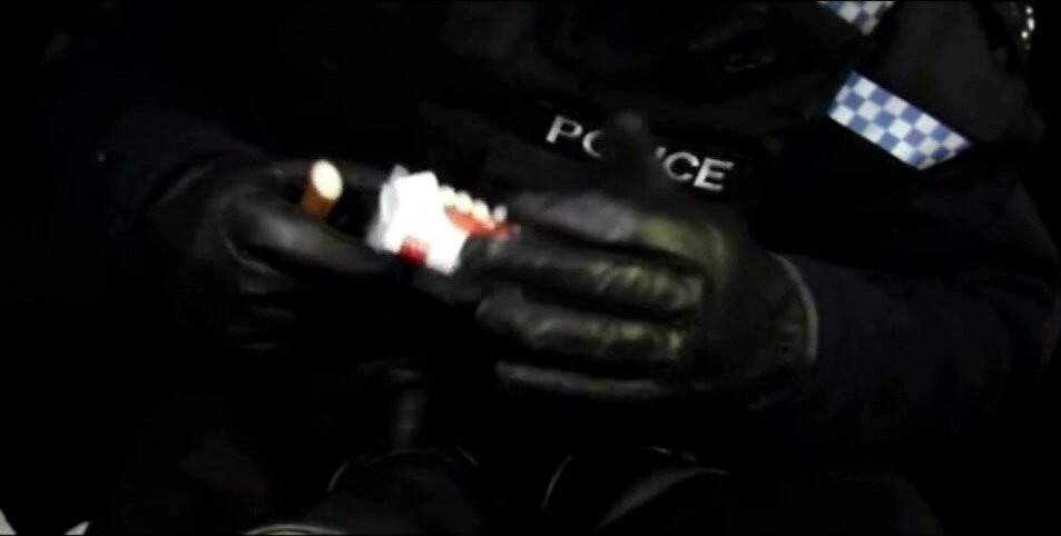 Smoking Cop Licking Boots