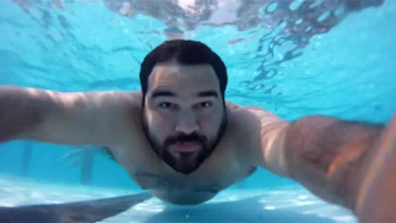 Barefaced Bear Swimming Underwater