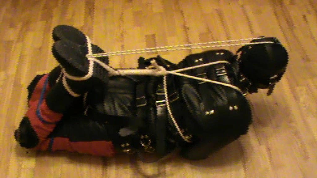 Hogtied Biker In A Straitjacket
