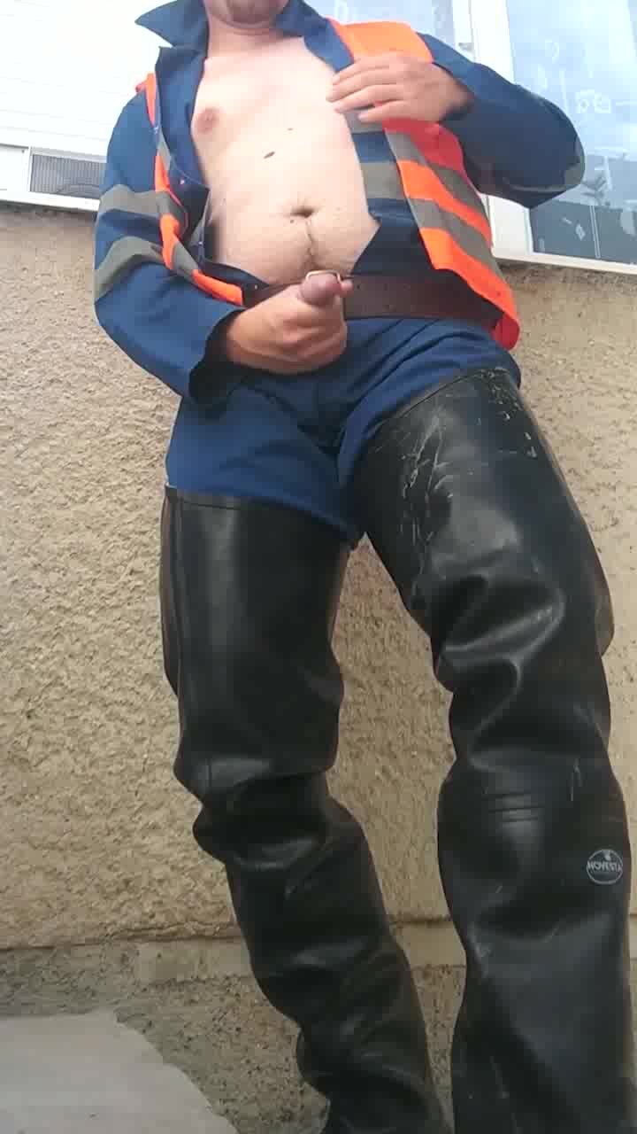 Worker Covering Rubber Waders In Cum