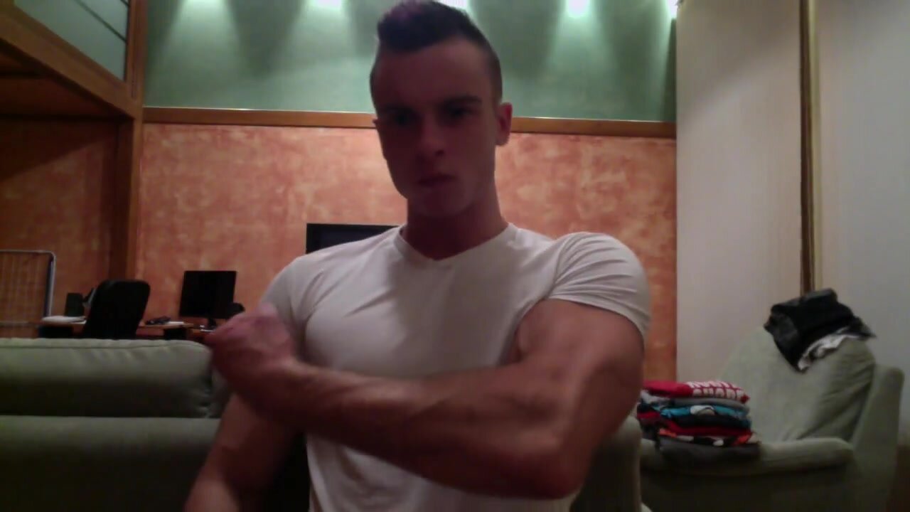 Guy Flexing His Biceps