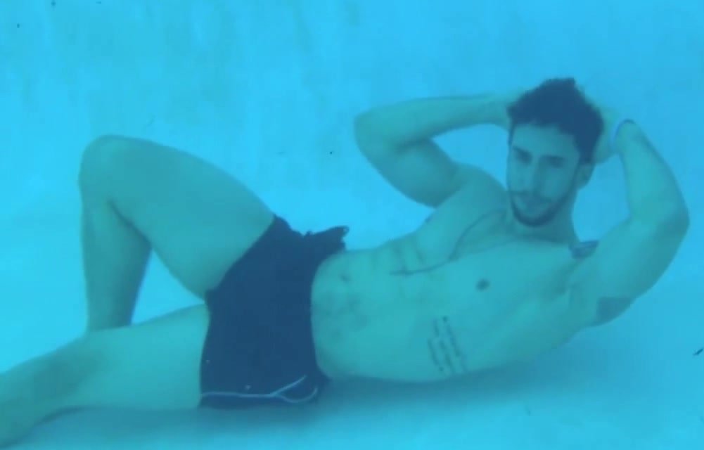 Fit Model Posing Barefaced Underwater