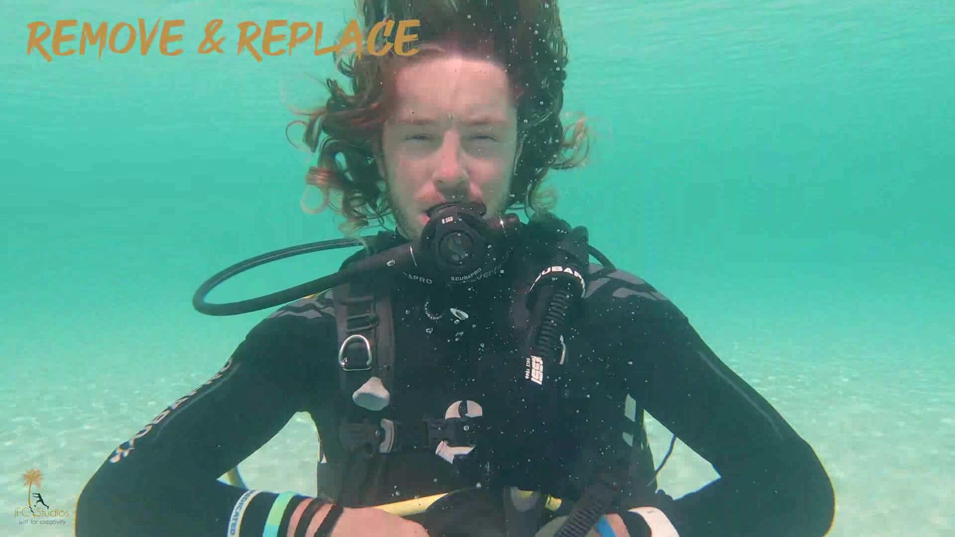 Long Haired Blonde Removing Mask Underwater