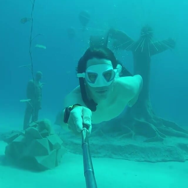 Freediving Underwater In White Mask