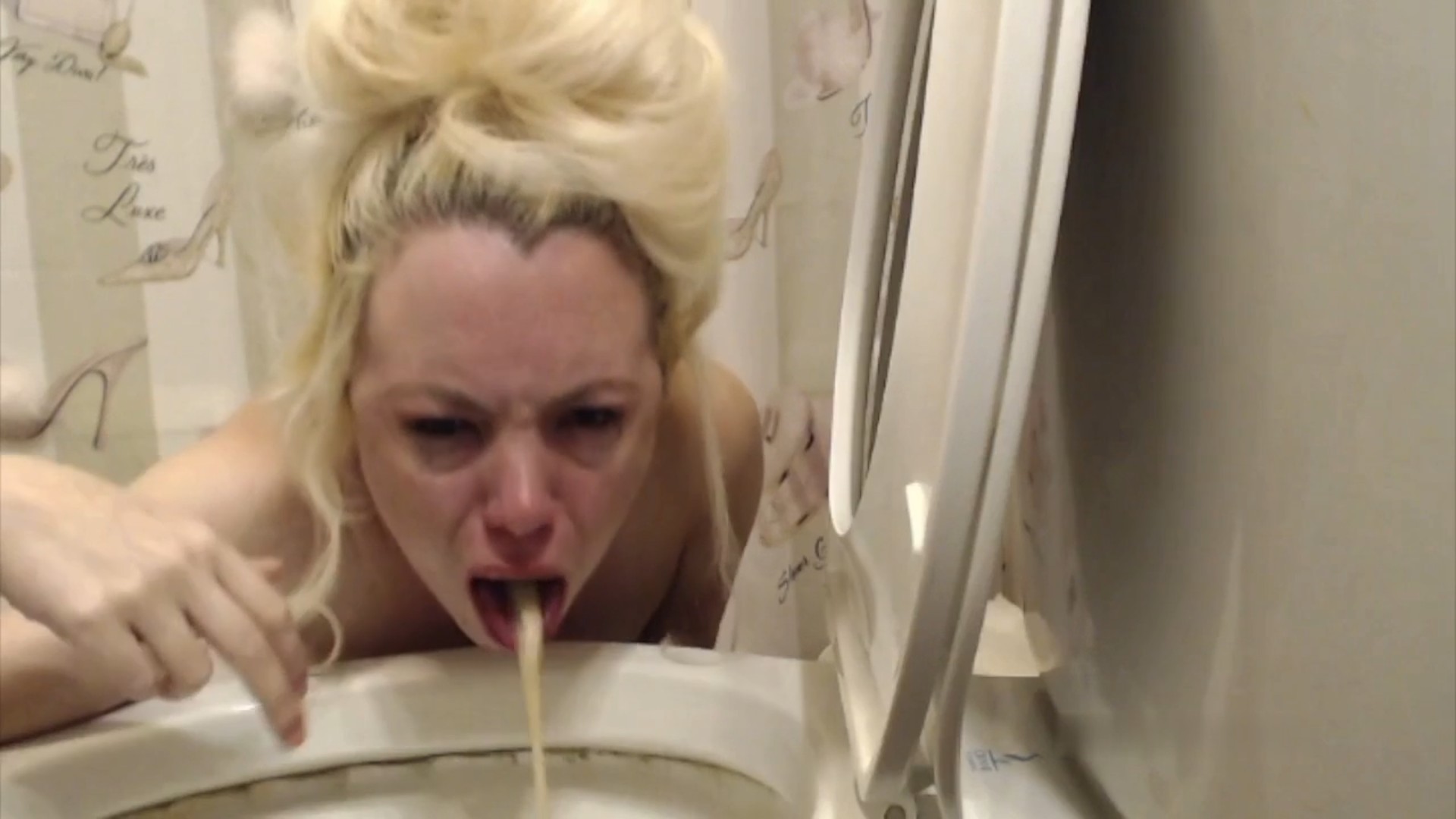 Blonde Slut Vomits In The Toilet Bowl