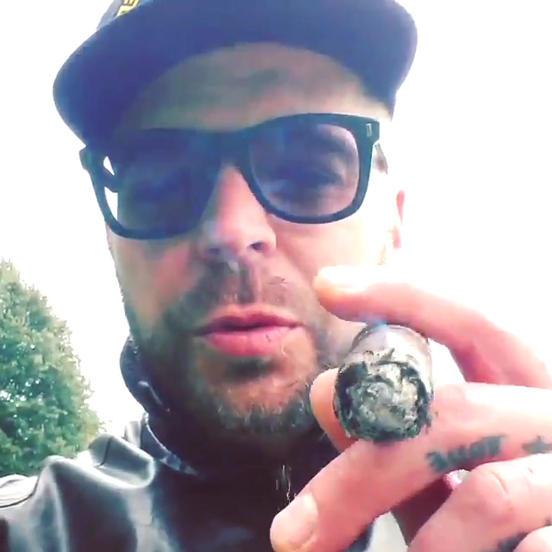 Leather Coat Daddy Smokes A Cigar
