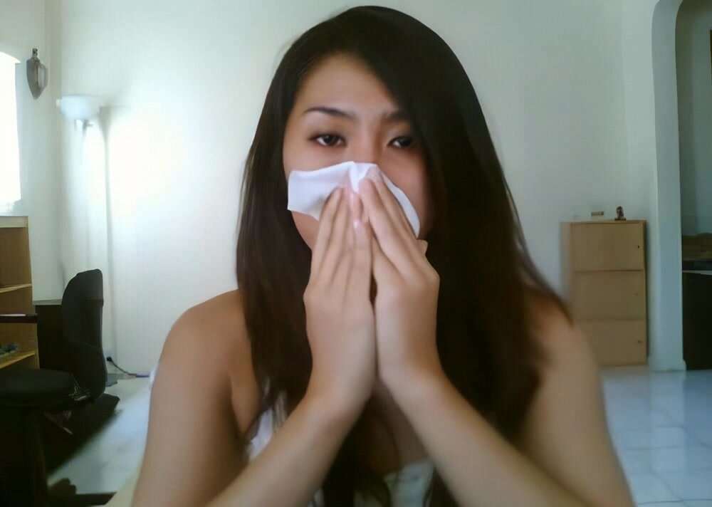 Cute Asian Sneezing