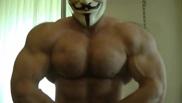 Muscle God Flexing With Mask