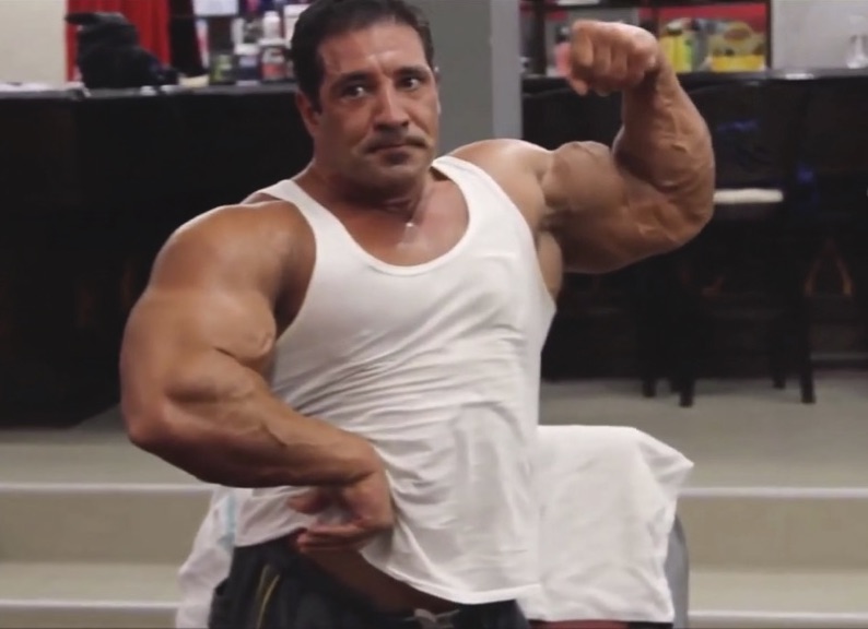 Muscle Bodybuilder Biceps Train And Pose