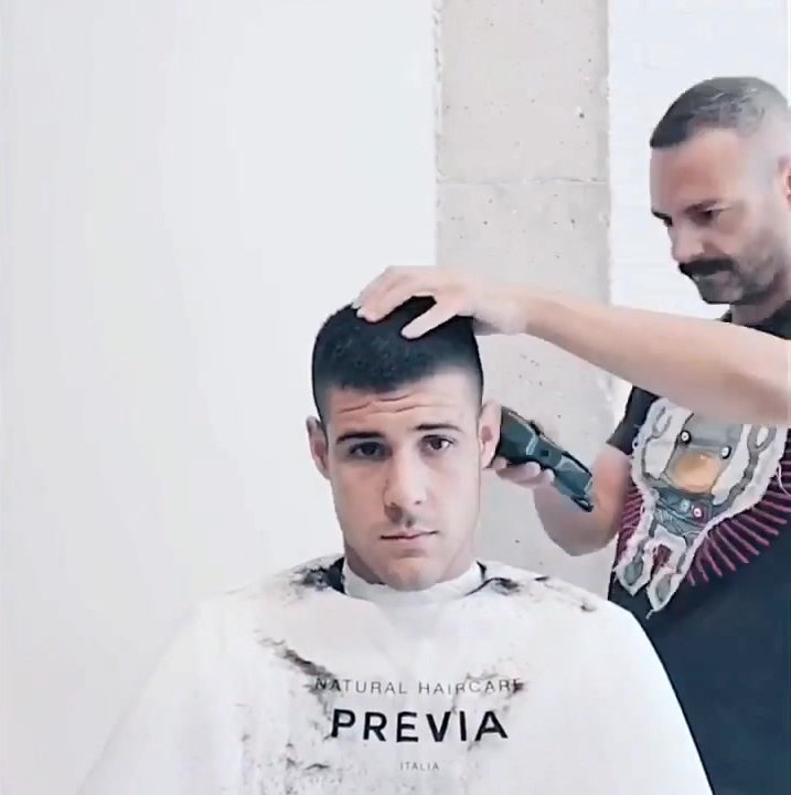 Hot Barber Gives A Short Haircut